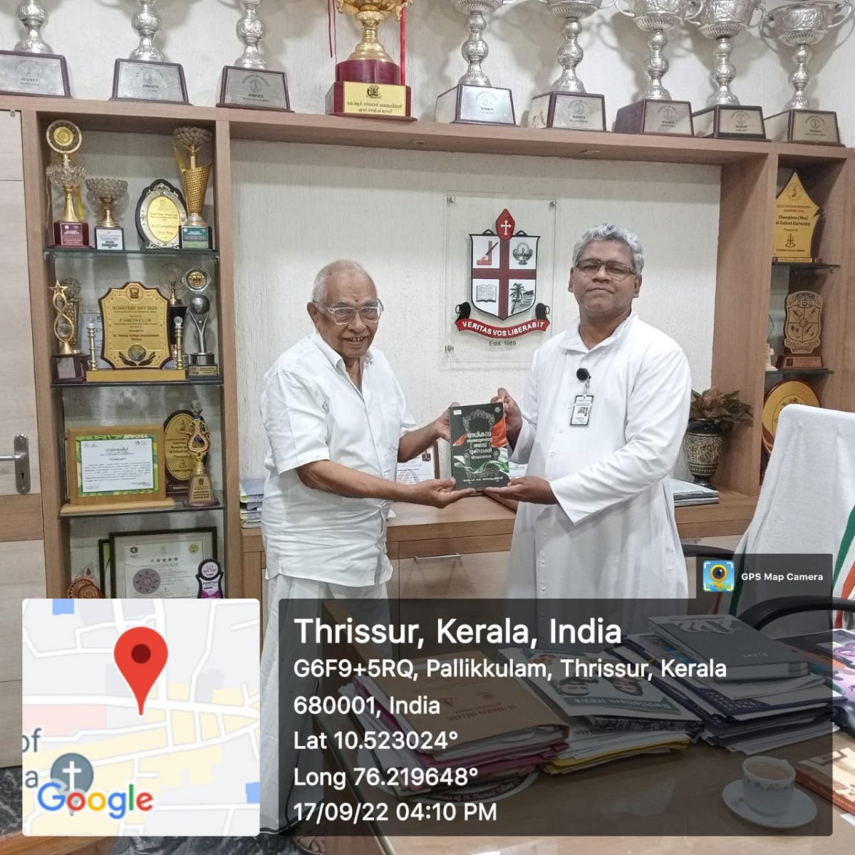 Dr P K Balakrishnan (former Student, during 1955) handing over his ...